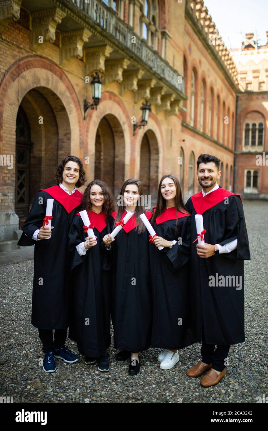 Female graduates hugging hi-res stock photography and images - Alamy