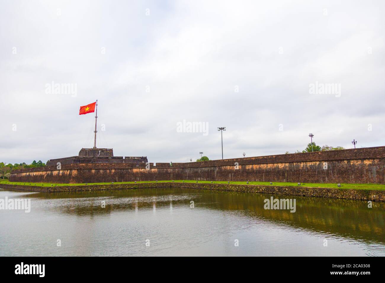 Hue, ancient capital of Vietnam. Ancient Citadel with gate and national ...