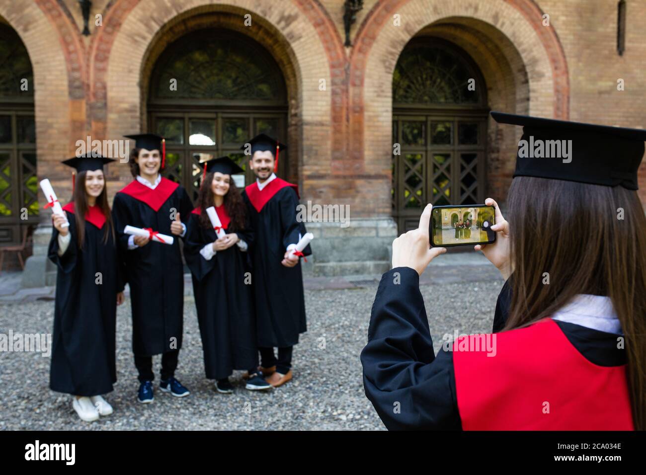 Group of students taking a picture in their graduation Stock Photo - Alamy