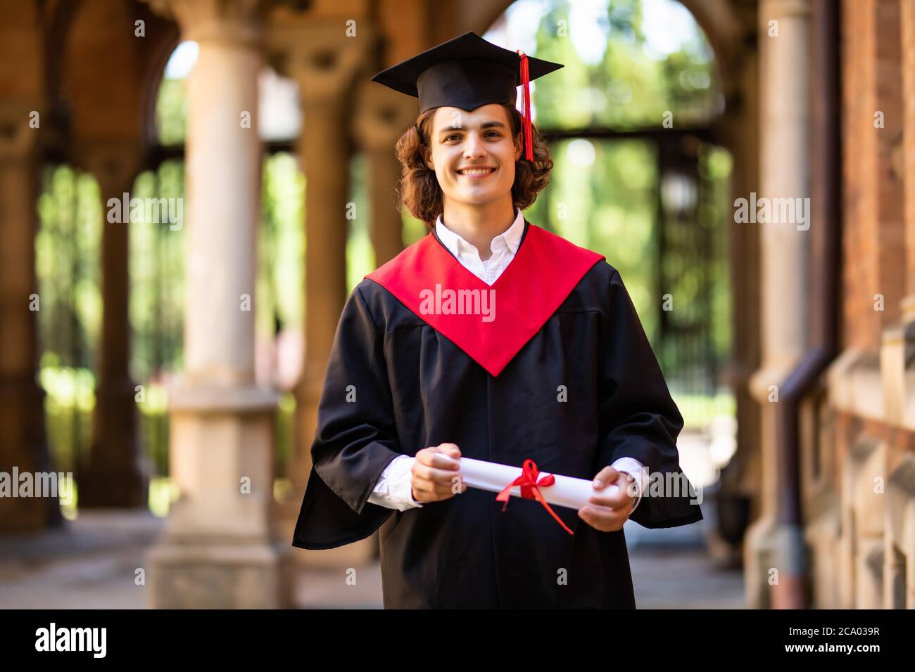 Young man graduation outfit family hi-res stock photography and images ...