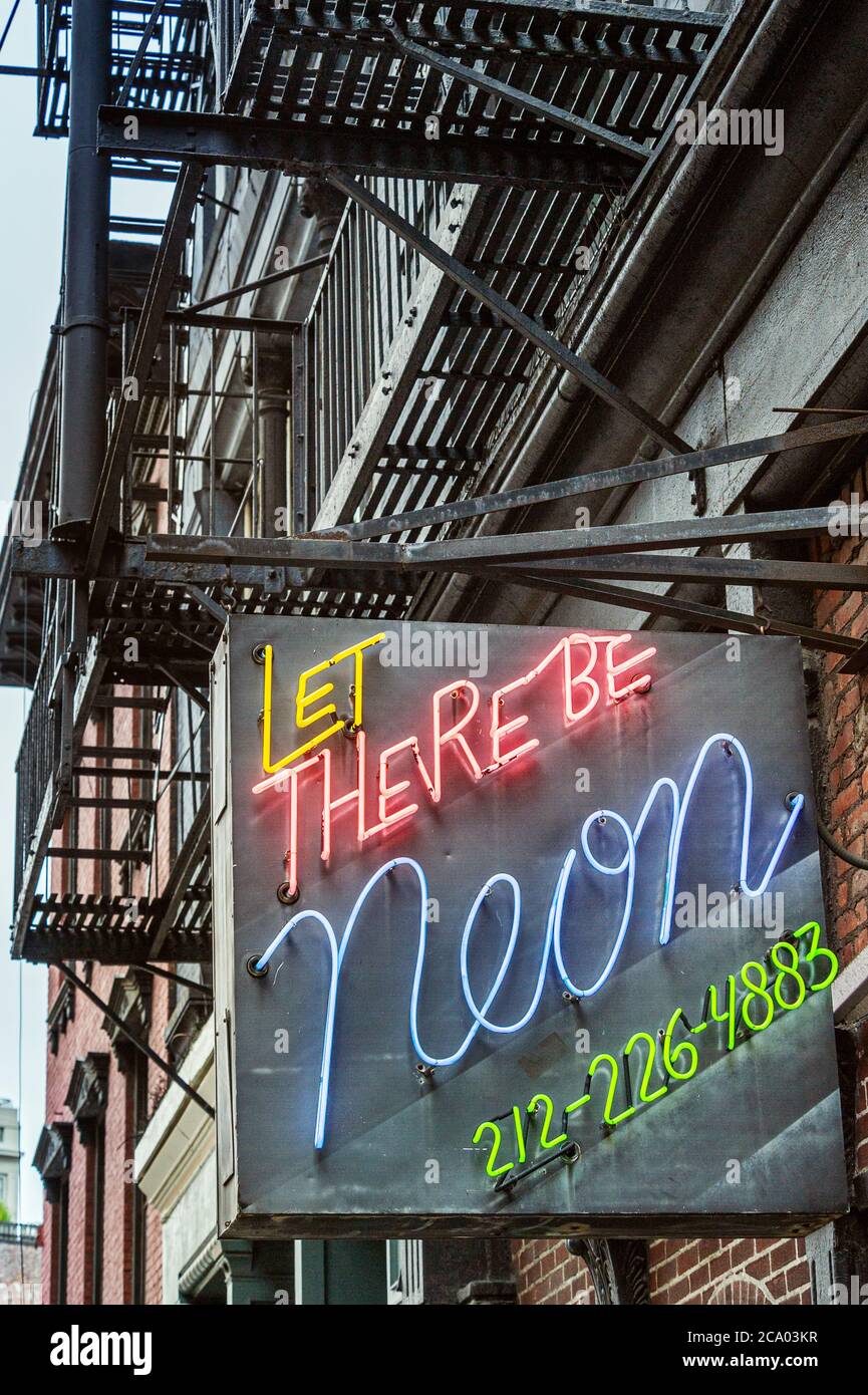Neon sign in SoHo area, New York City Stock Photo - Alamy