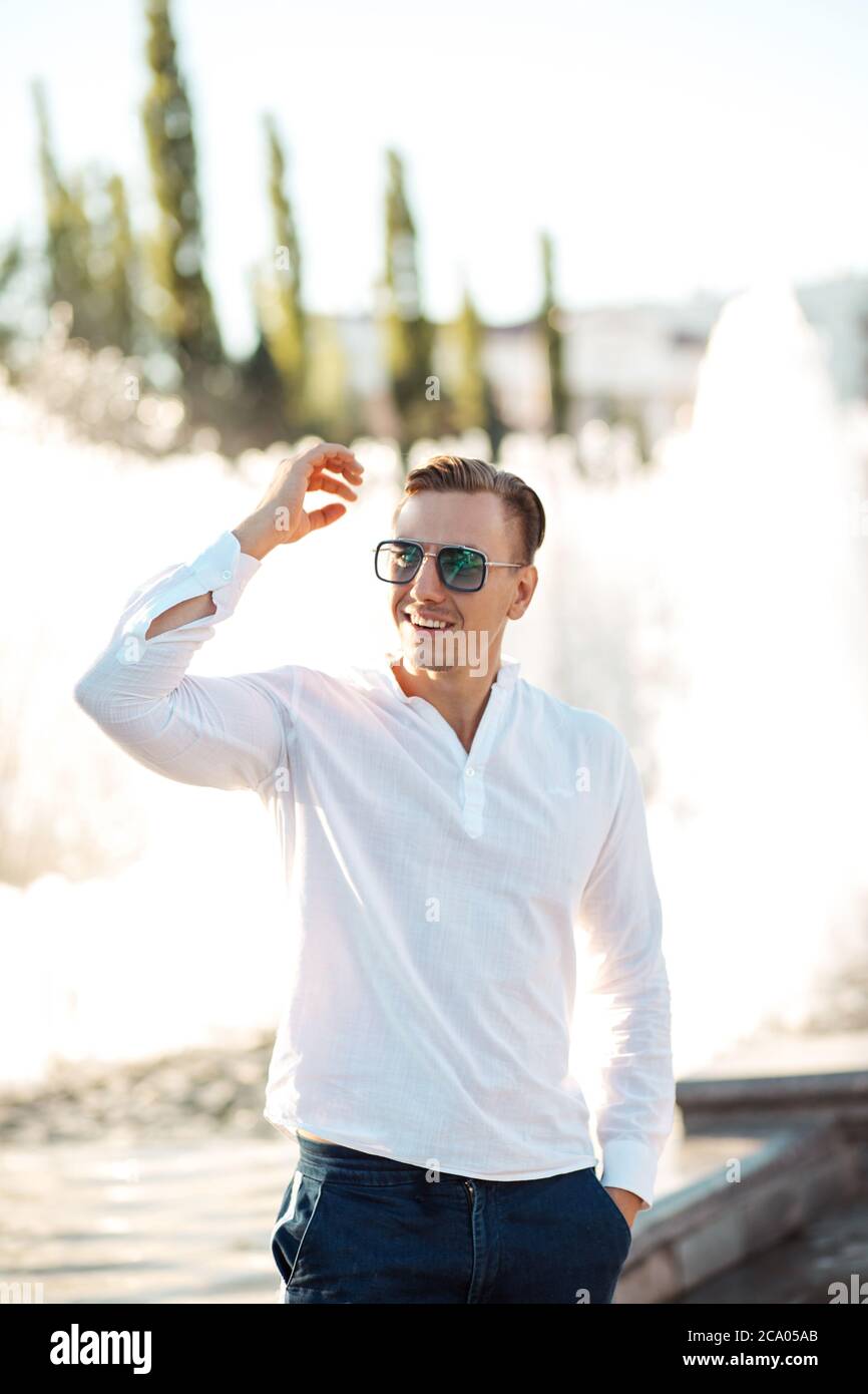 Blond male model wearing blue shirt hi-res stock photography and images ...