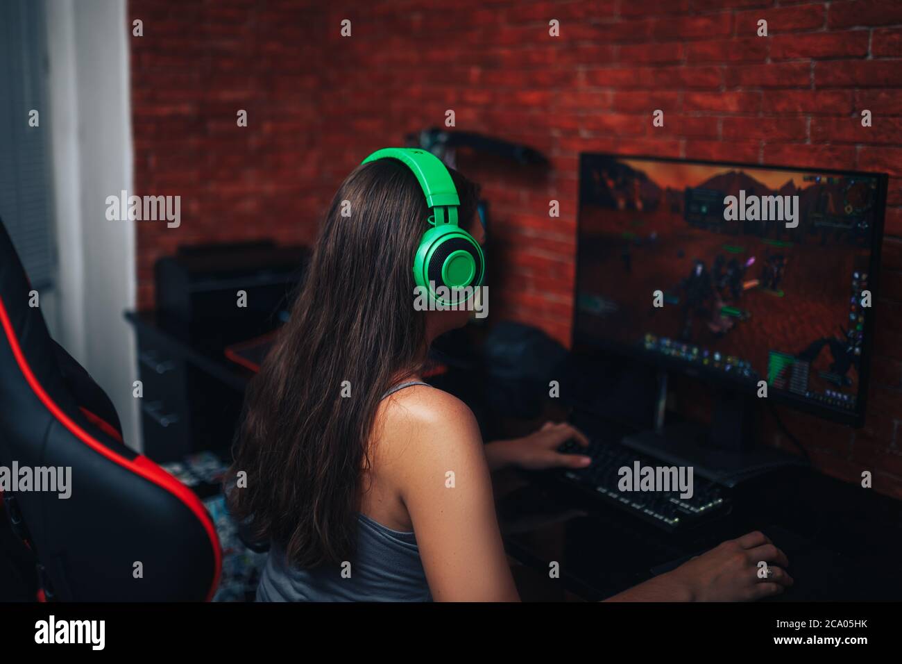 young girl playing game on computer, banner Stock Photo - Alamy
