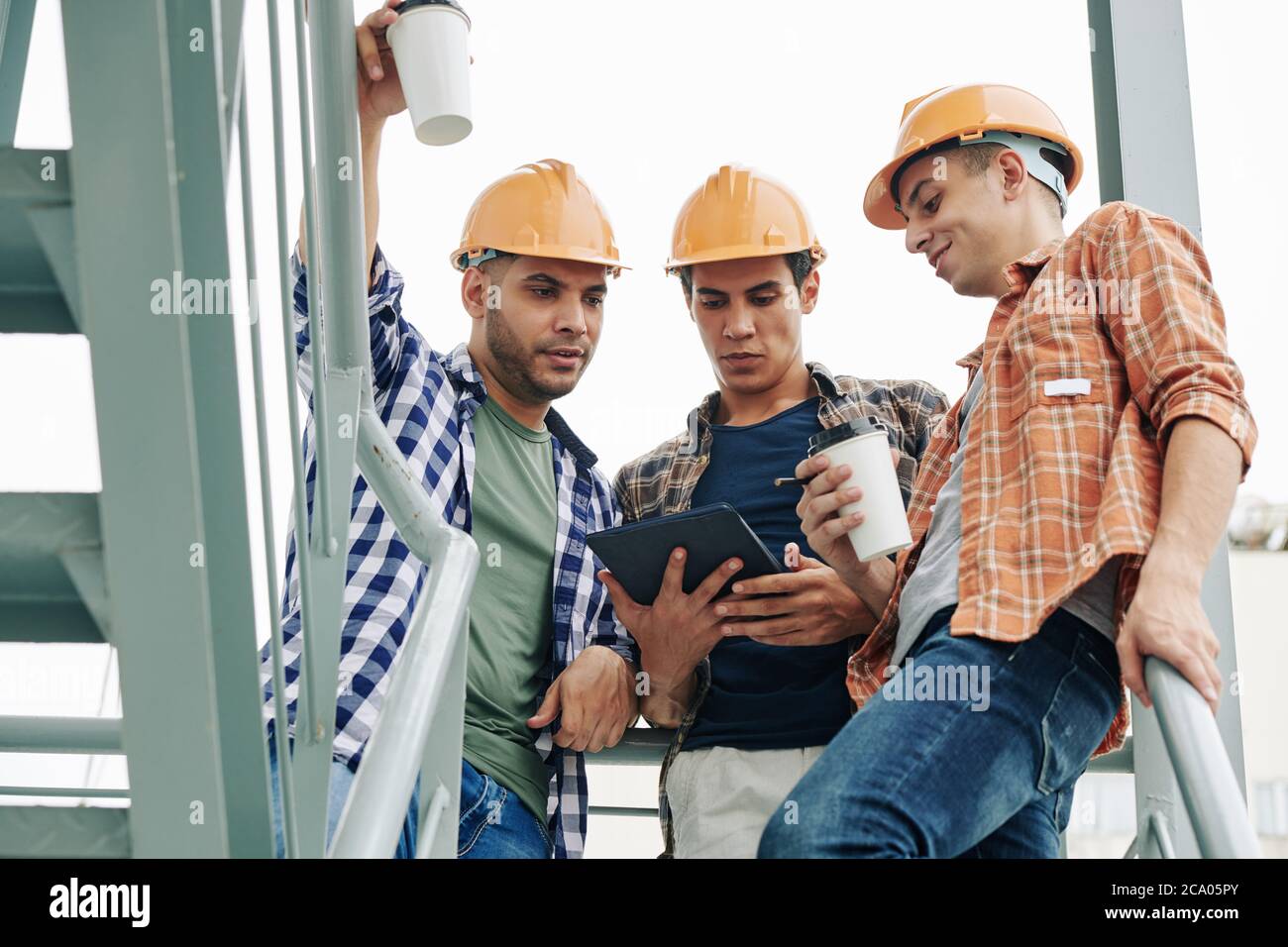 Construction drinking coffee construction site hi-res stock photography ...