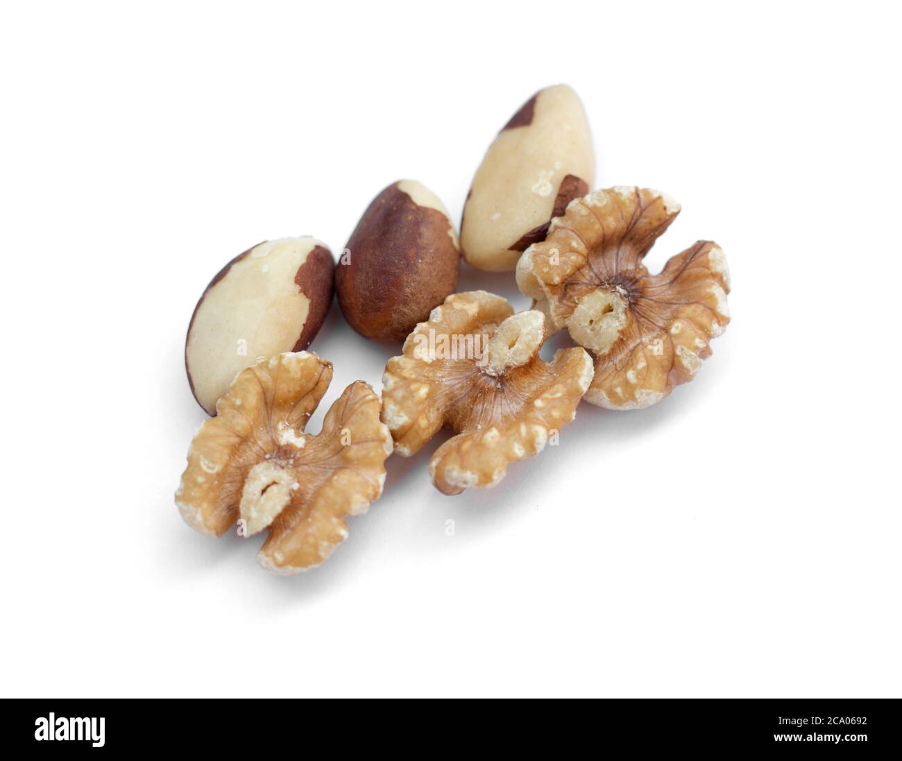Nuts on a white background Cut Out Stock Images & Pictures - Alamy