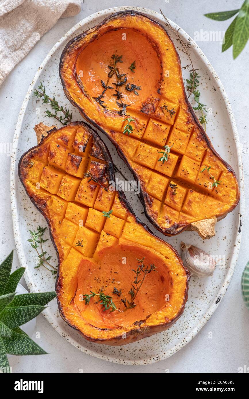 Roasted butternut squash pumpkin and herbs Stock Photo - Alamy