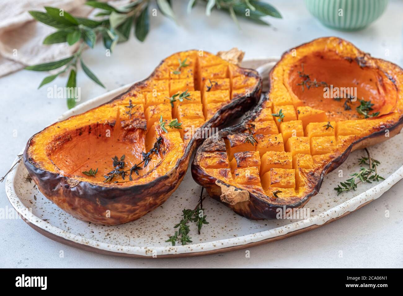 Roasted butternut squash pumpkin and herbs Stock Photo - Alamy