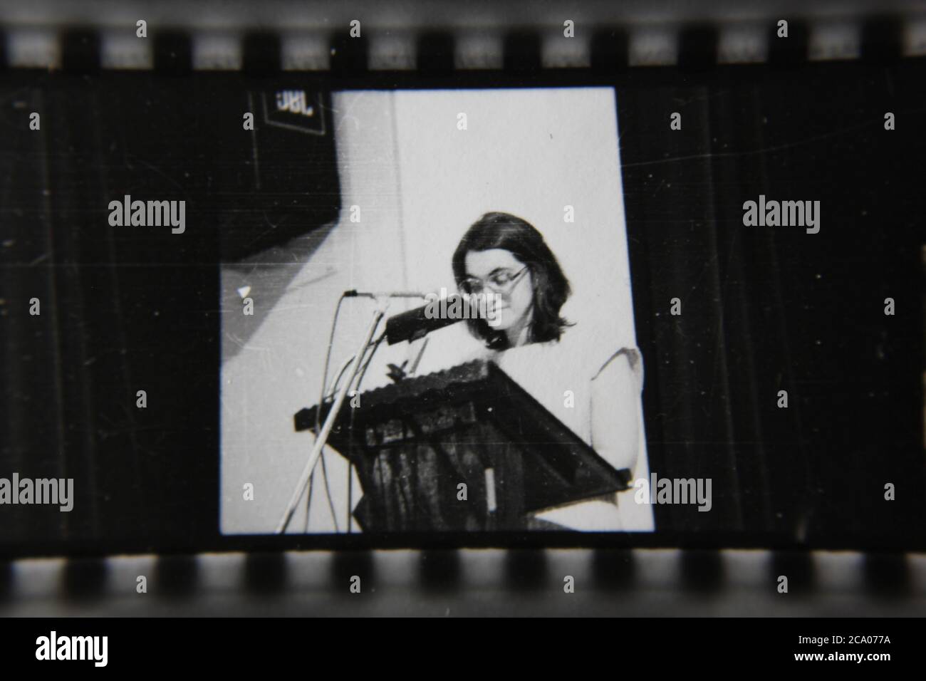 Fine 1970s vintage black and white photography of an adult speaker ...