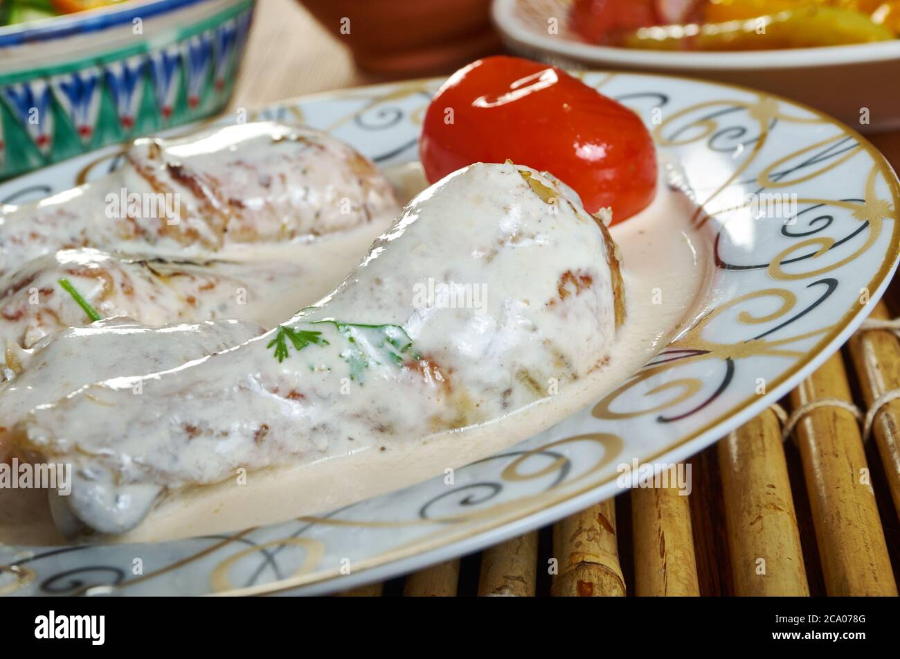 Chkmeruli - traditional Georgian dish of chicken in garlic sauce Stock ...