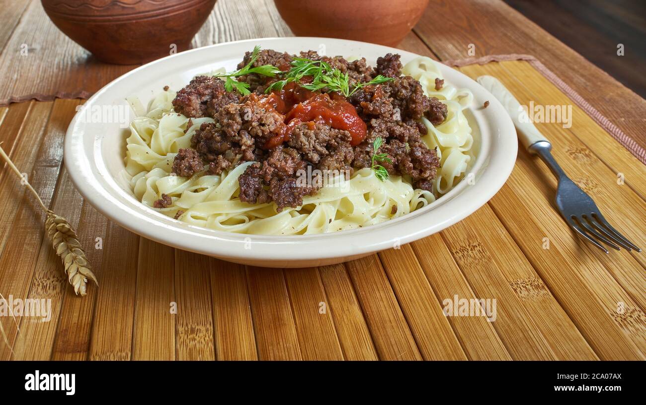 Rich ragu - Classic Italian beef ragu with shredded beef Stock Photo ...