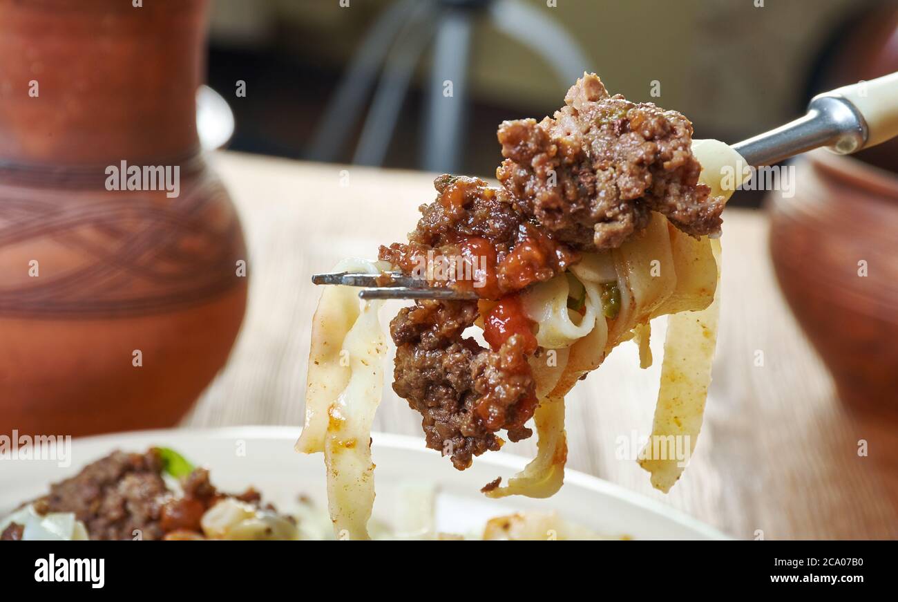 Rich ragu - Classic Italian beef ragu with shredded beef Stock Photo ...