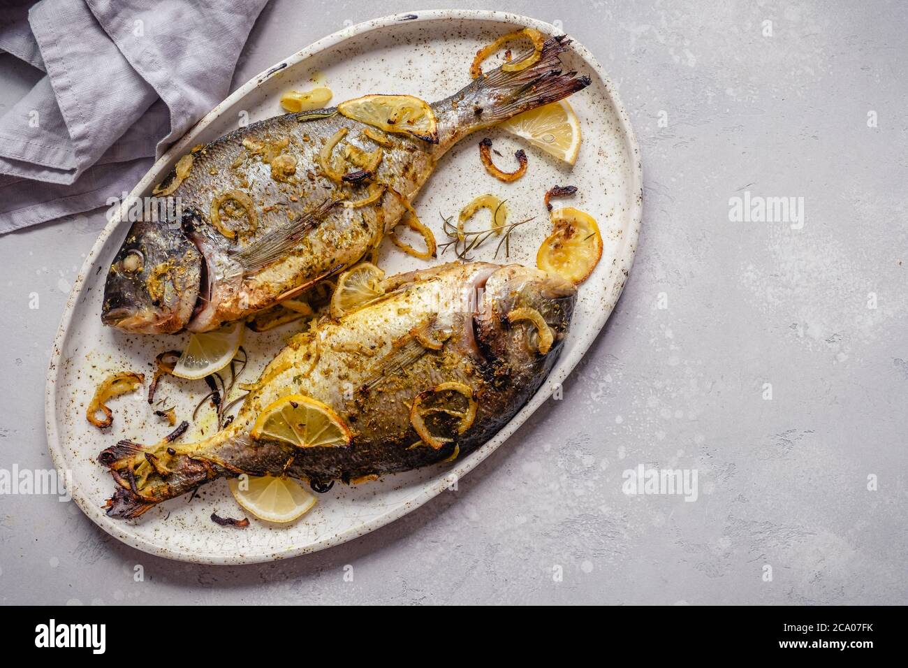 Baked fish dorado Stock Photo - Alamy