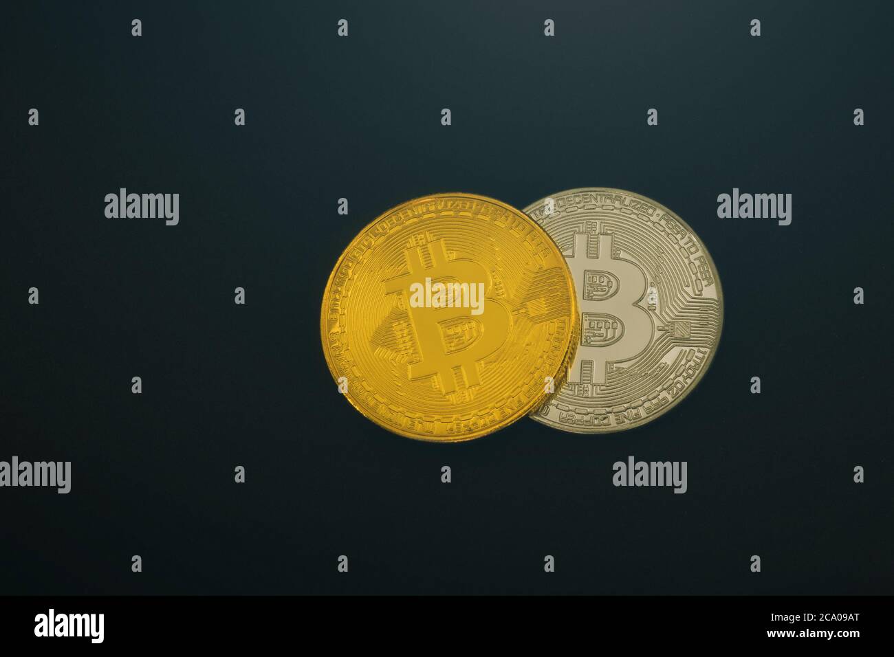 Silver and gold coin Bitcoin on a black background. Isolate Stock Photo ...