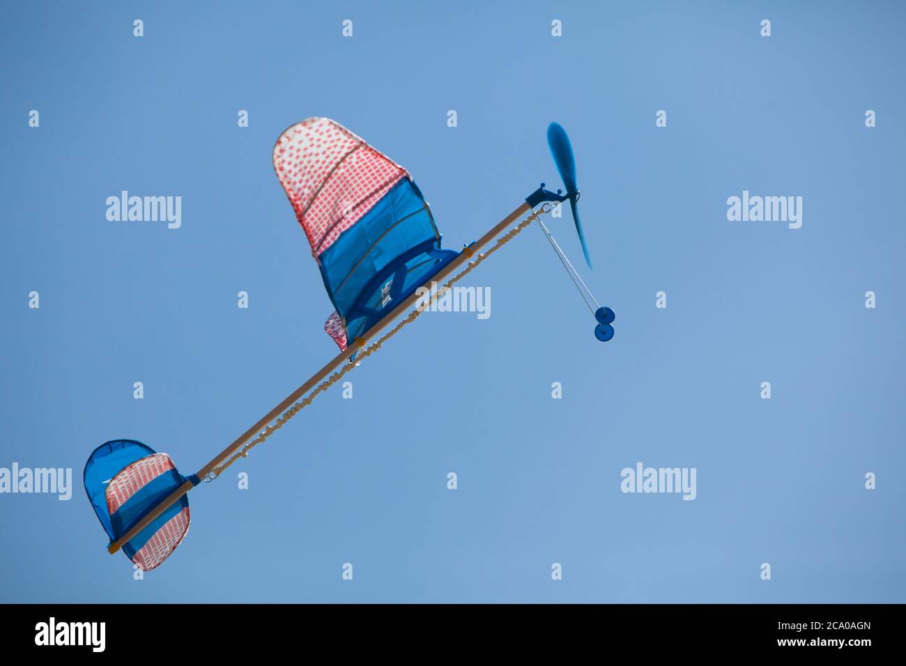 Rubber powered glider flying in the sky. model airplane Stock Photo - Alamy