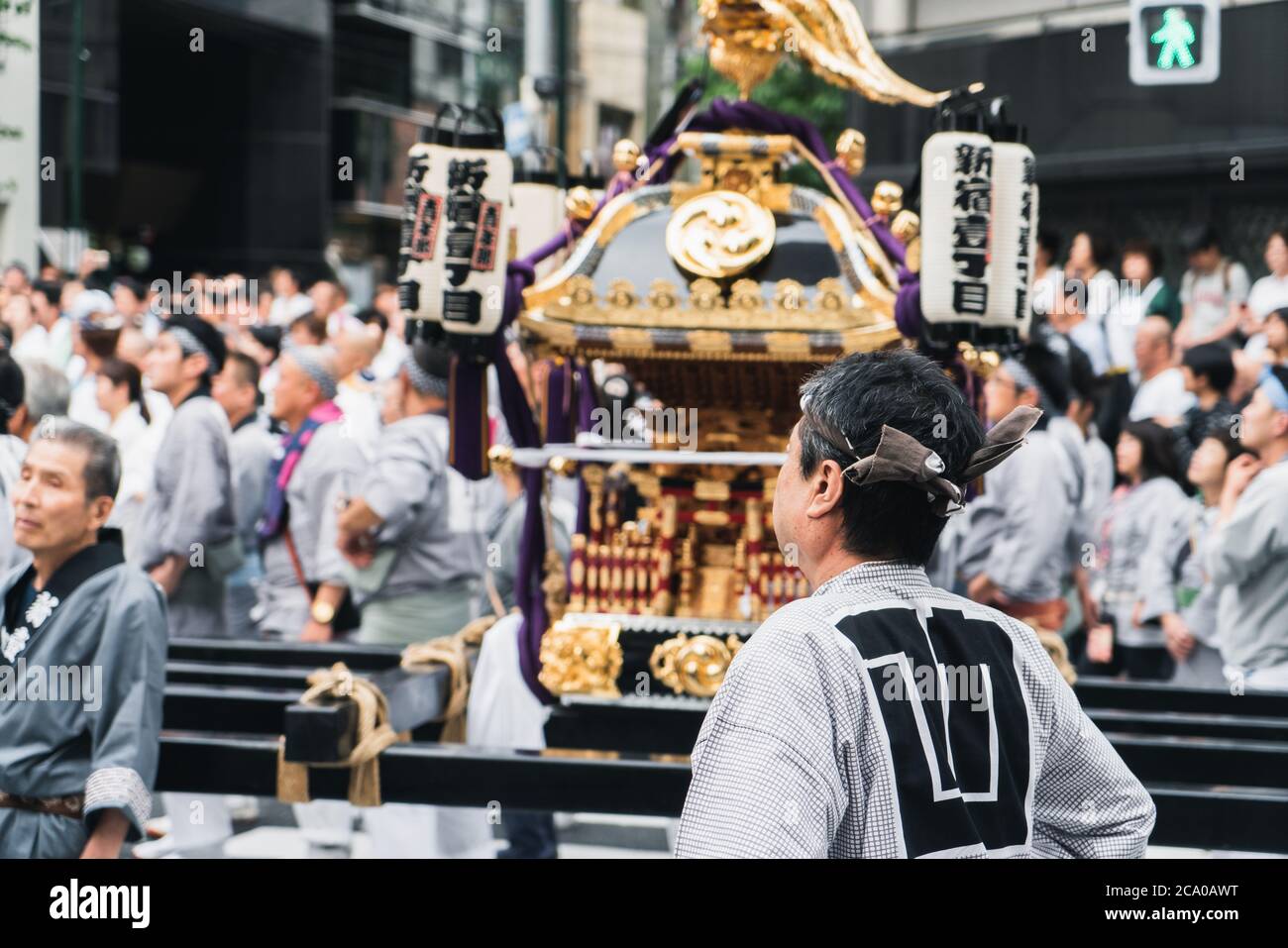 Crowds of japanese people carrying Shinto Shrine Mikoshi around the ...