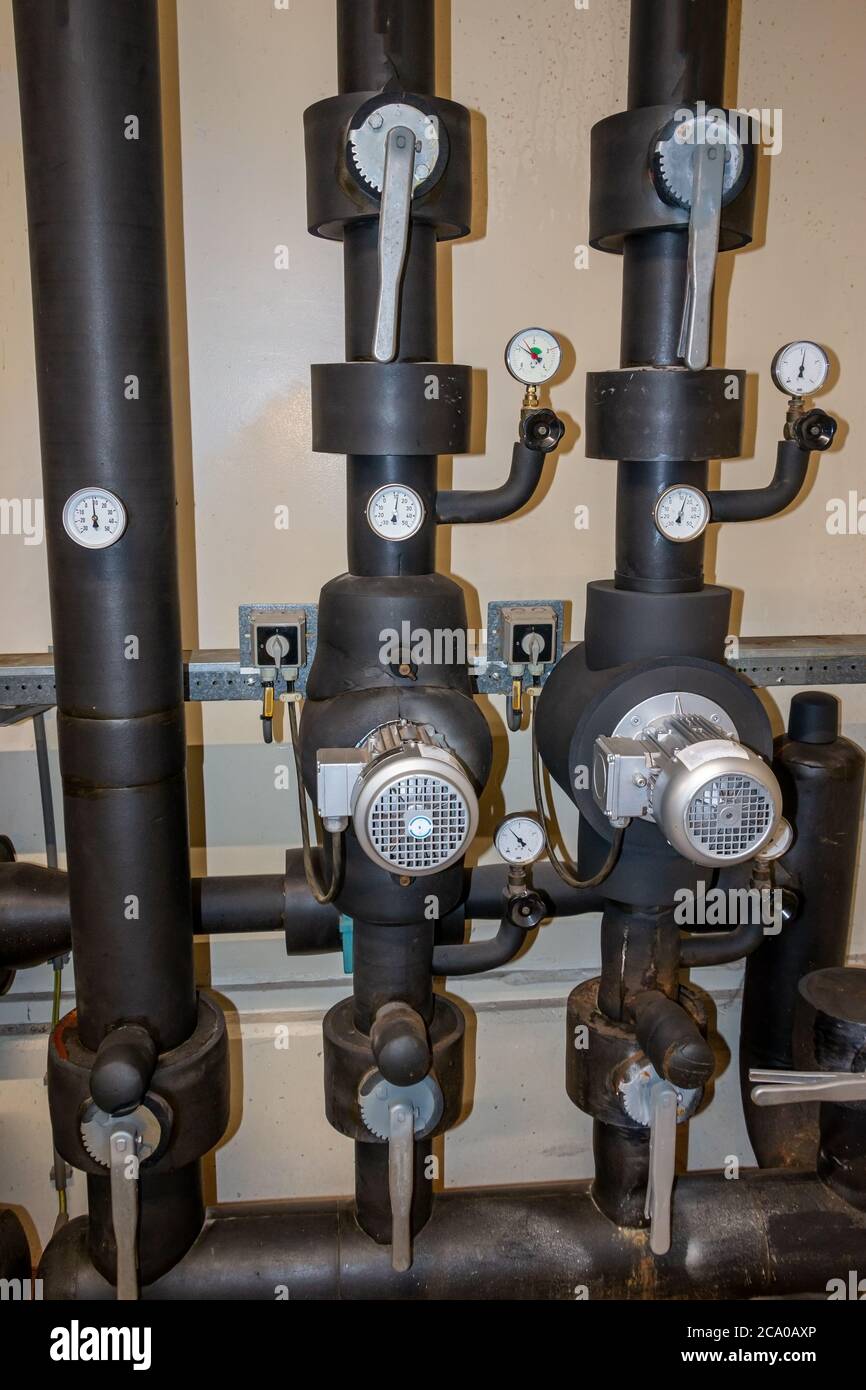 Central heating system in an industrial building, with insulated pipes ...