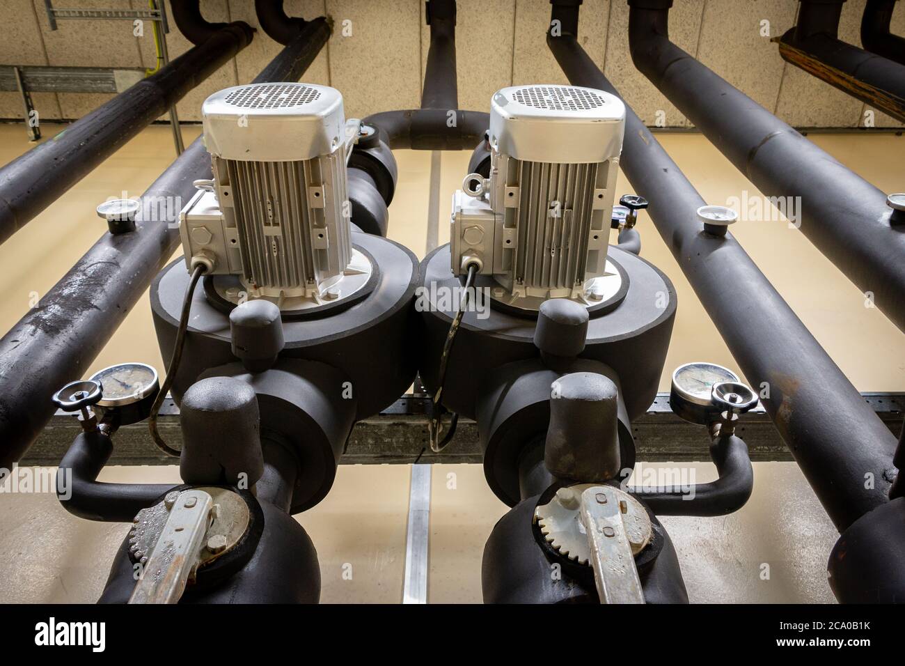 Central heating system in an industrial building, with insulated pipes ...