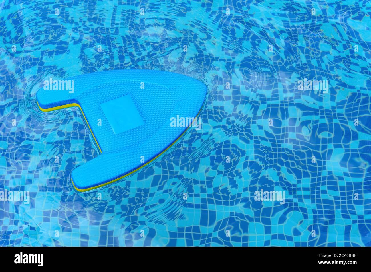 blue floating pad on a swimming pool Stock Photo - Alamy