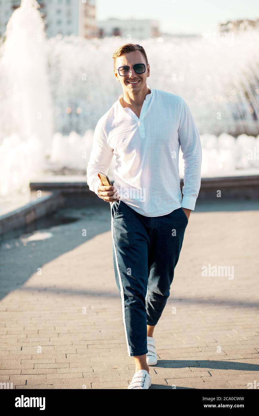 Blond male model wearing blue shirt hi-res stock photography and images ...