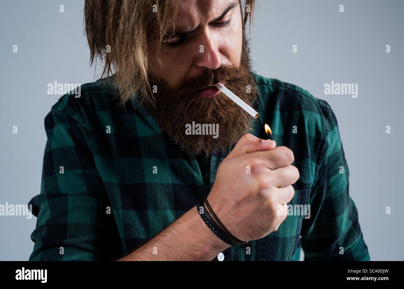 Health safety and addiction. handsome brutal man. bearded man. smoking ...
