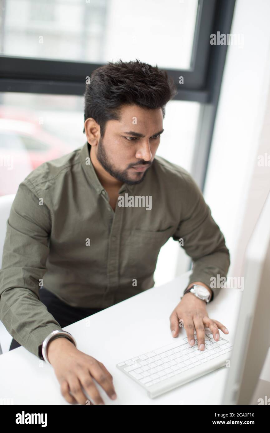 Indian guy working at night hi-res stock photography and images - Alamy