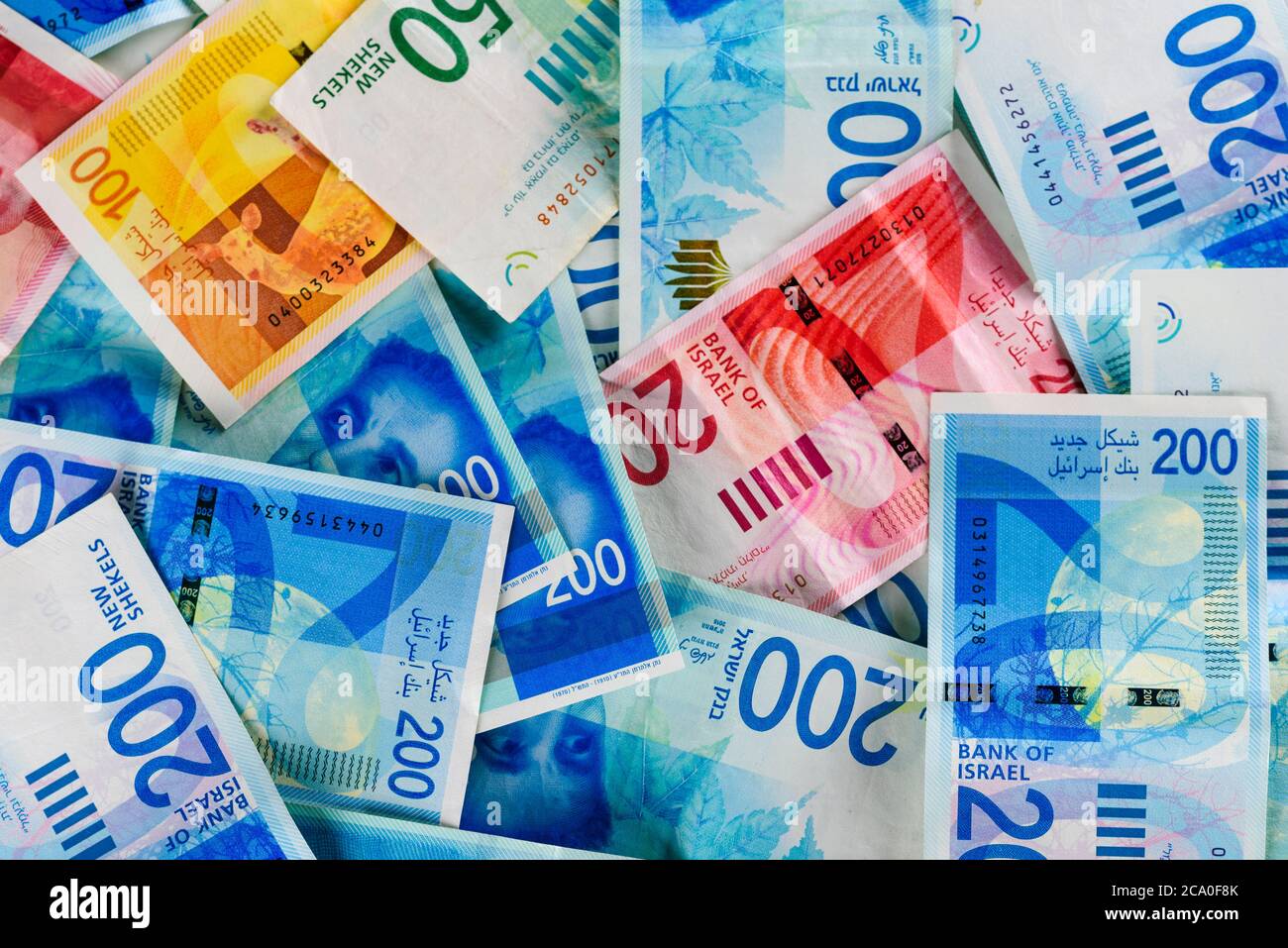 Stack of various Israeli shekel bills. Israel money banknotes of 50, 20 ...