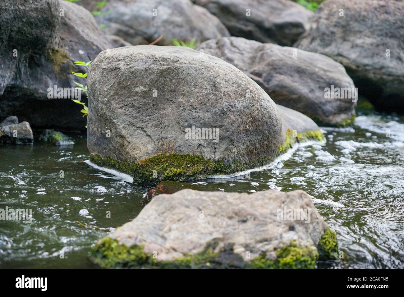 Creek flows among rocks hi-res stock photography and images - Alamy