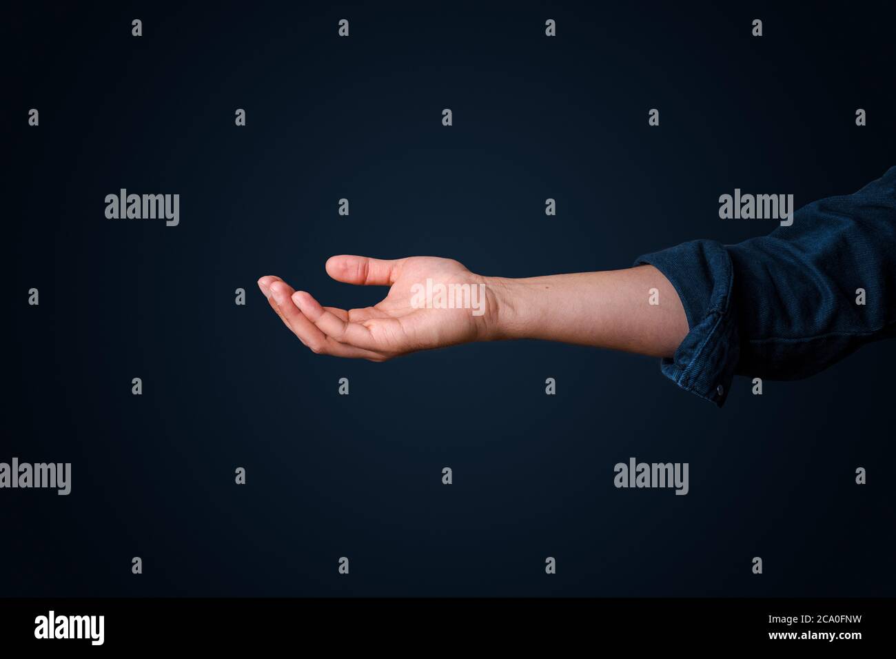 This male looking hand is holding something or is waiting to catch ...