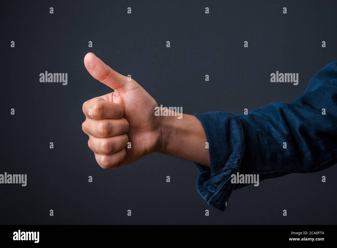 this male thumb up sign shows with this international gesture ...