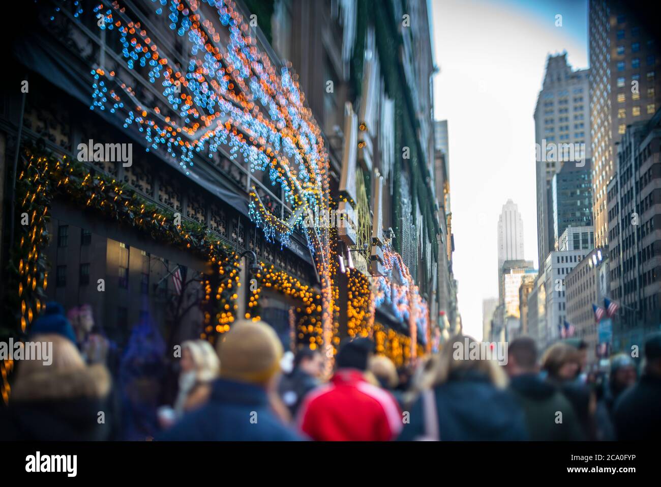 Crowd of people visit to see the SAKS Fifth Avenue Christmas window ...
