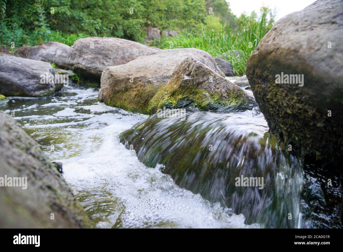 Creek flows among rocks hi-res stock photography and images - Alamy