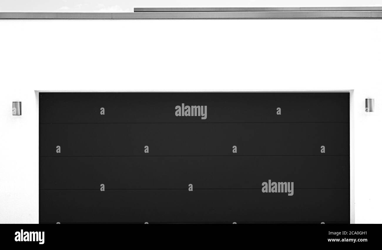 Modern garage in a minimalist rectangular design in a housing estate ...