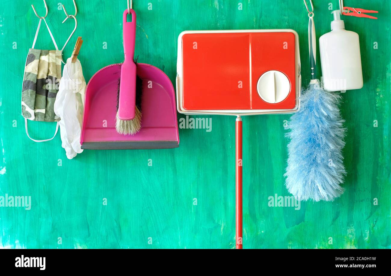 House cleaning in times of coronavirus, face mask,gloves,germicide ...