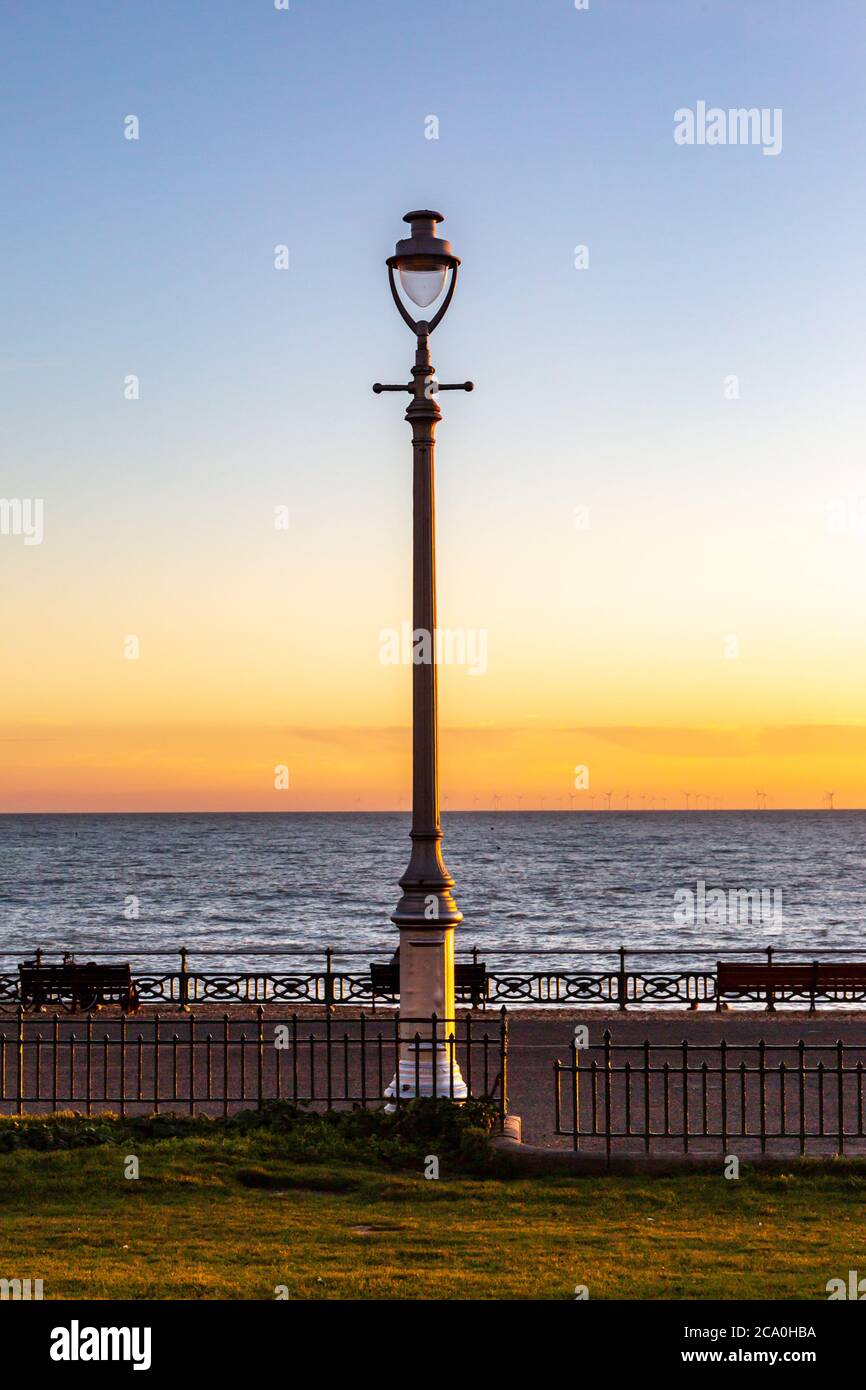 A Lamp Post on the Promenade at Brighton, with a Sunset Sky Behind ...