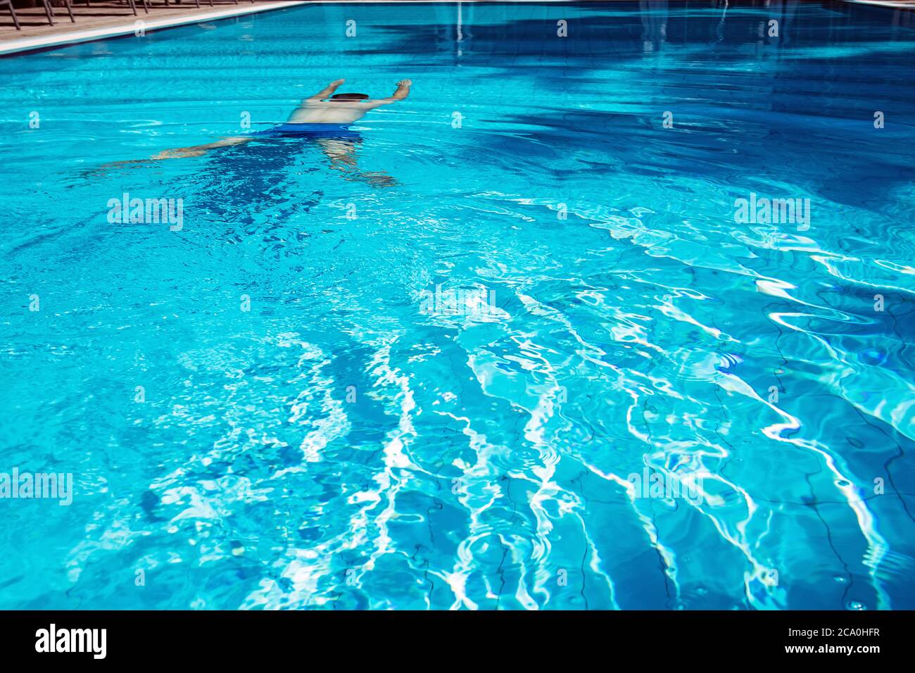 Man swimming underwater pool hi-res stock photography and images - Alamy