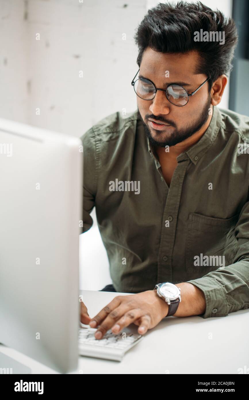 creative man with pc computer working at modern office Stock Photo - Alamy