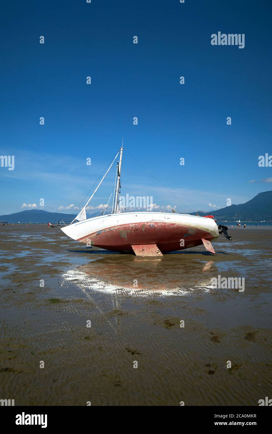 Beached Sailboat Spanish Banks Vancouver. A beached sailboat at low ...