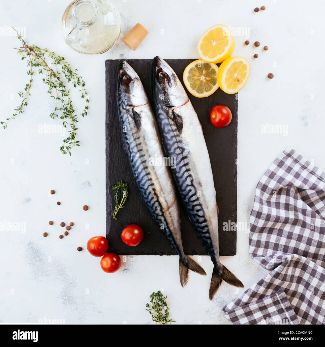 Raw mackerel fish cooking and ingredients Stock Photo - Alamy