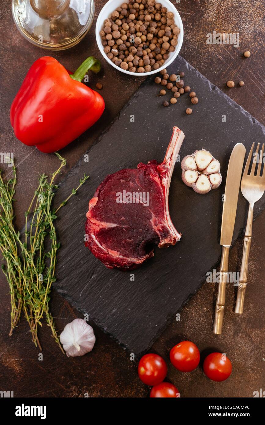 Raw steak cooking and ingredients Stock Photo - Alamy
