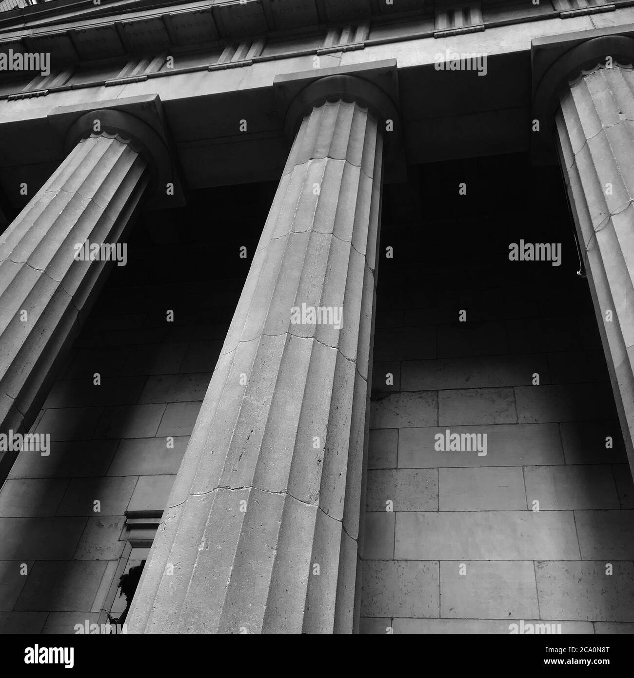 Low angle view of stone columns Stock Photo - Alamy