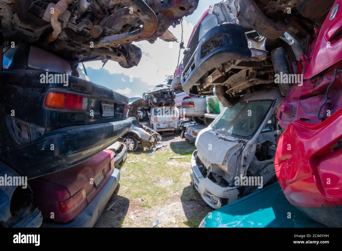 Old damaged cars on the junkyard waiting for recycling in Mexico City ...