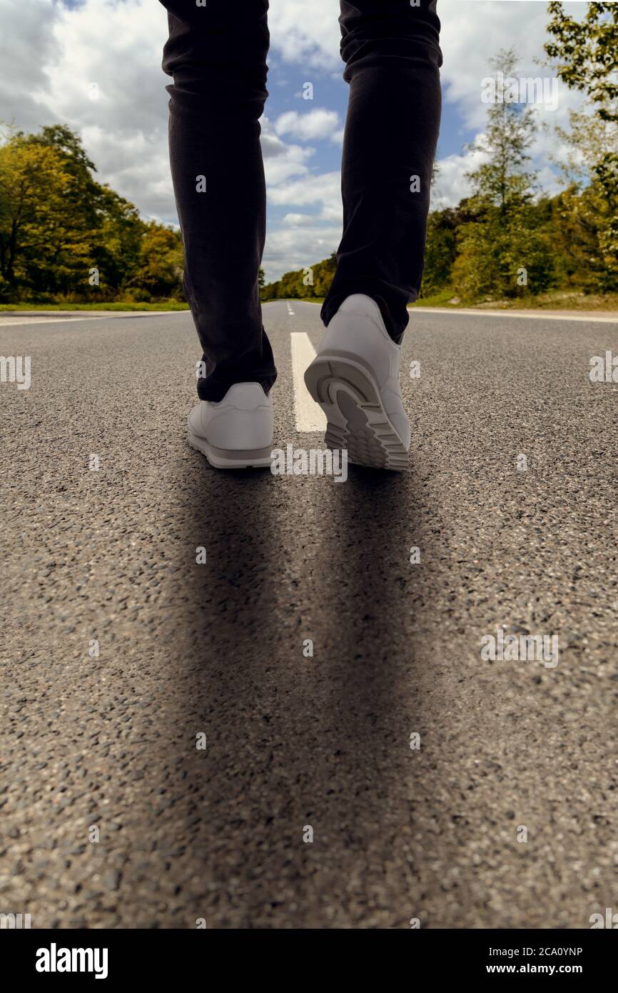 walking foots with white shoes on street Stock Photo - Alamy