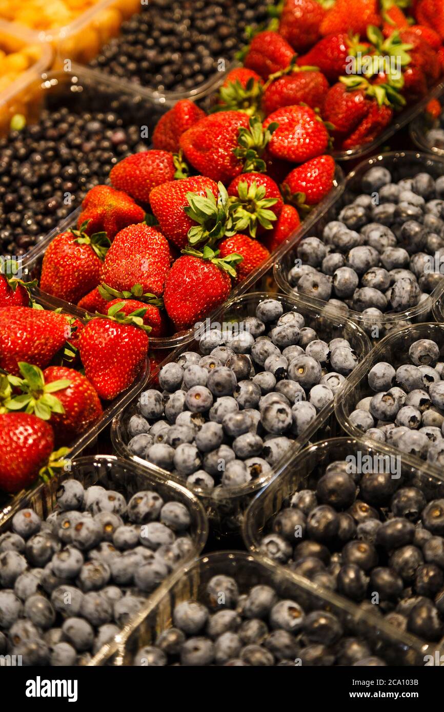 Colourful mix of different fresh berries at market Stock Photo - Alamy