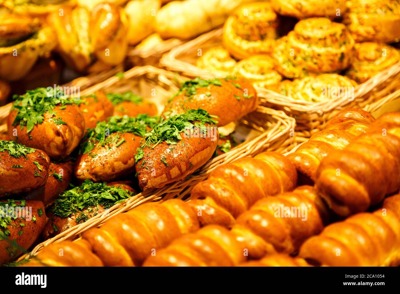 Mix of different fresh baking, pastry, small pie at the shelfs of ...