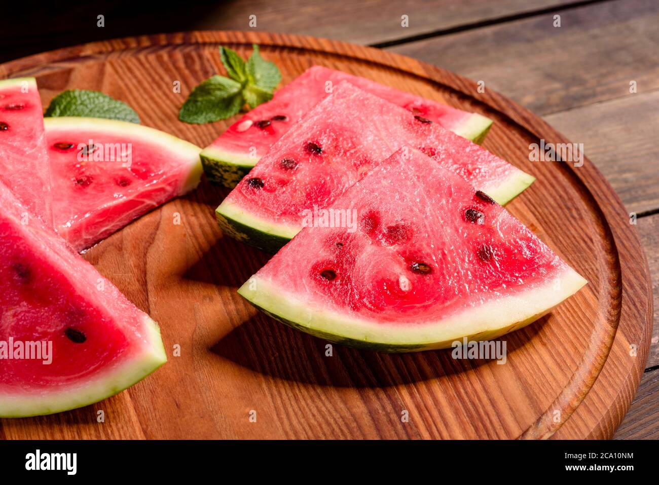 Fresh delicious watermelon sliced with mint and watermelon juice ...