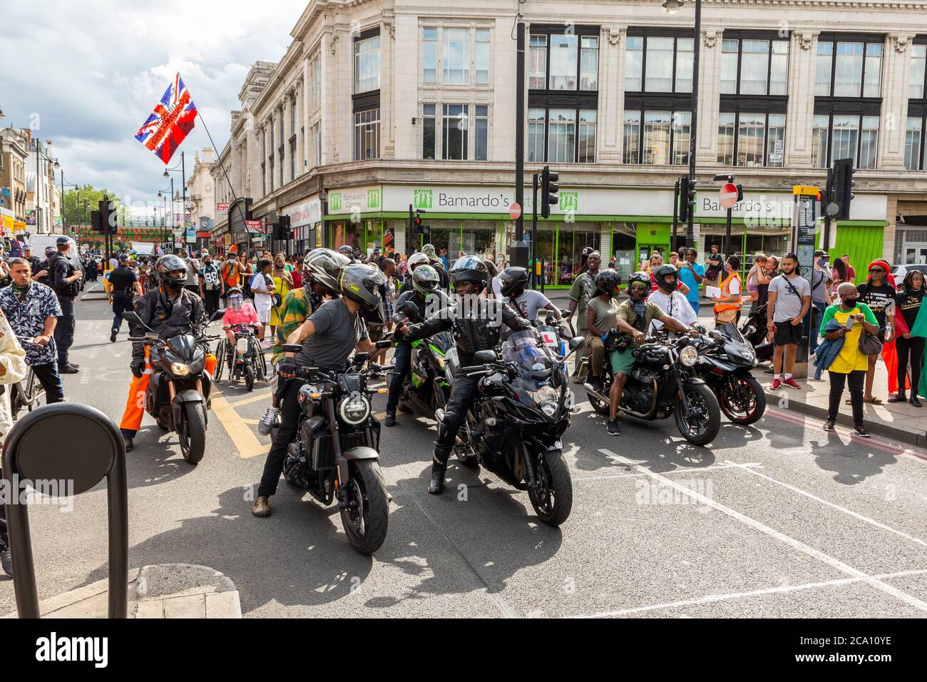 The Slow Boys riding motorbikes during the Afrikan Emancipation Day ...