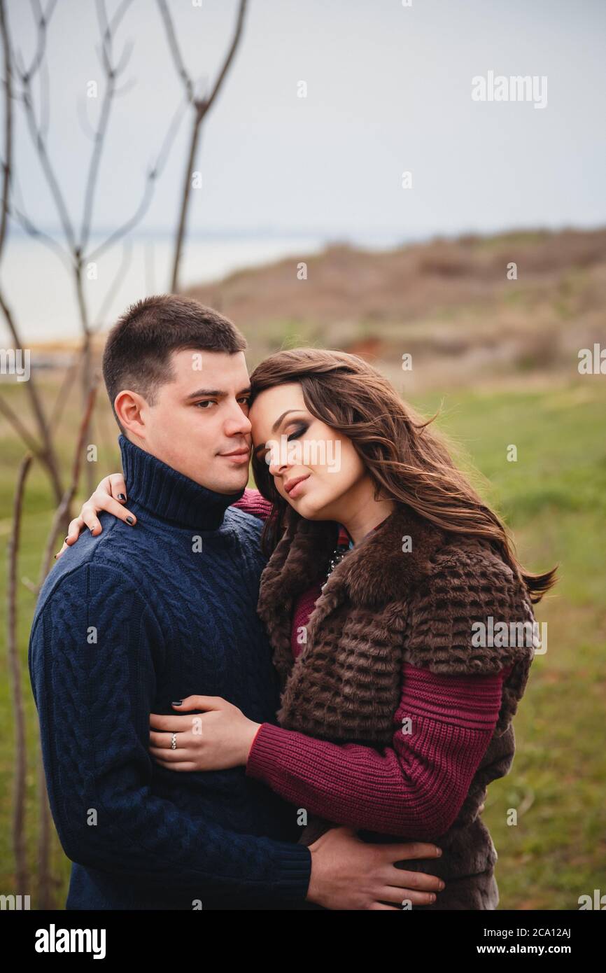 Young romantic couple hugging kiss hi-res stock photography and images ...