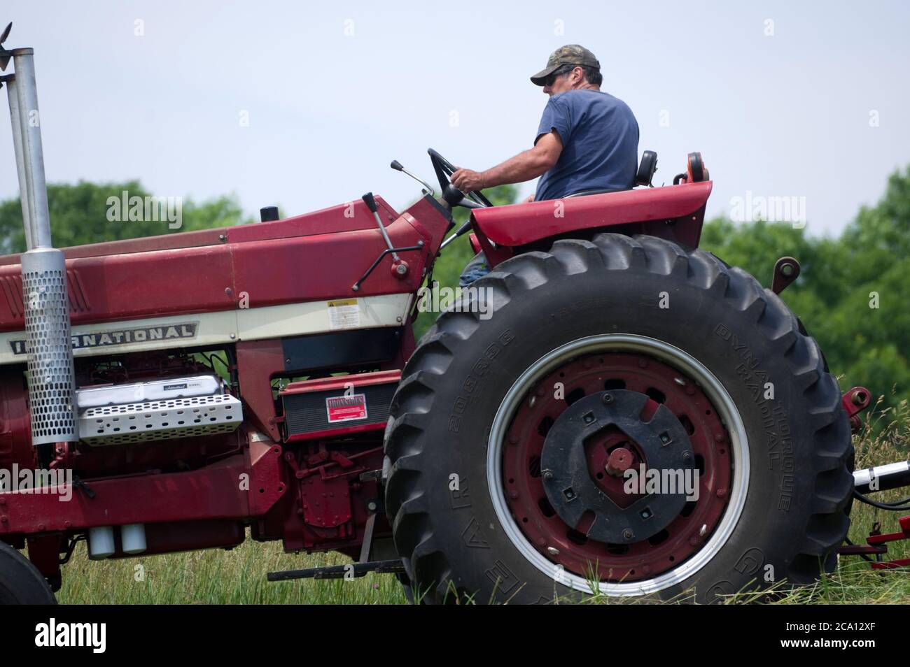 Farmer driving International Harvester Farmall model 1468 diesel Row ...