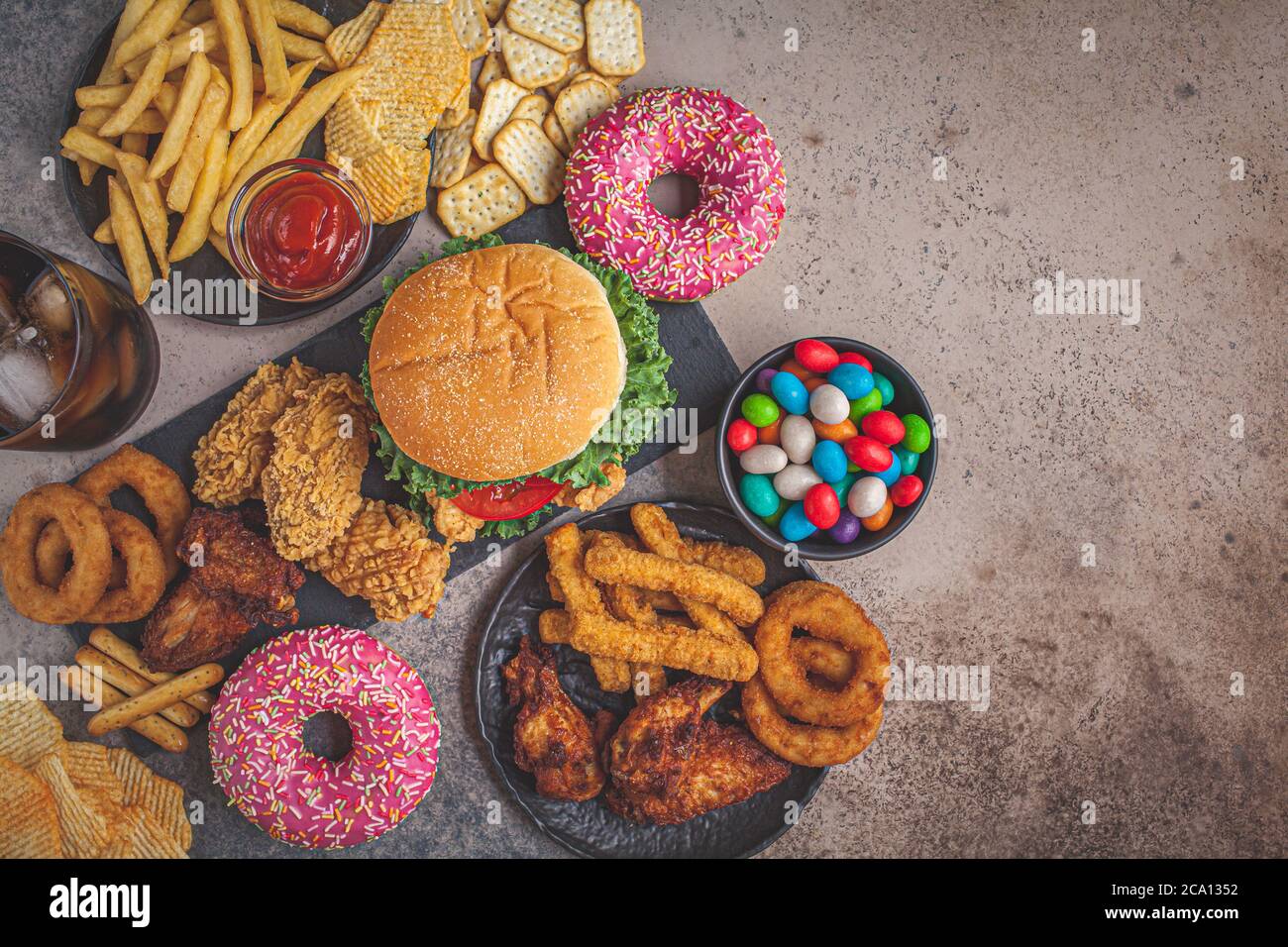 Fast food assortment. Junk food concept. Unhealthy food for the heart ...