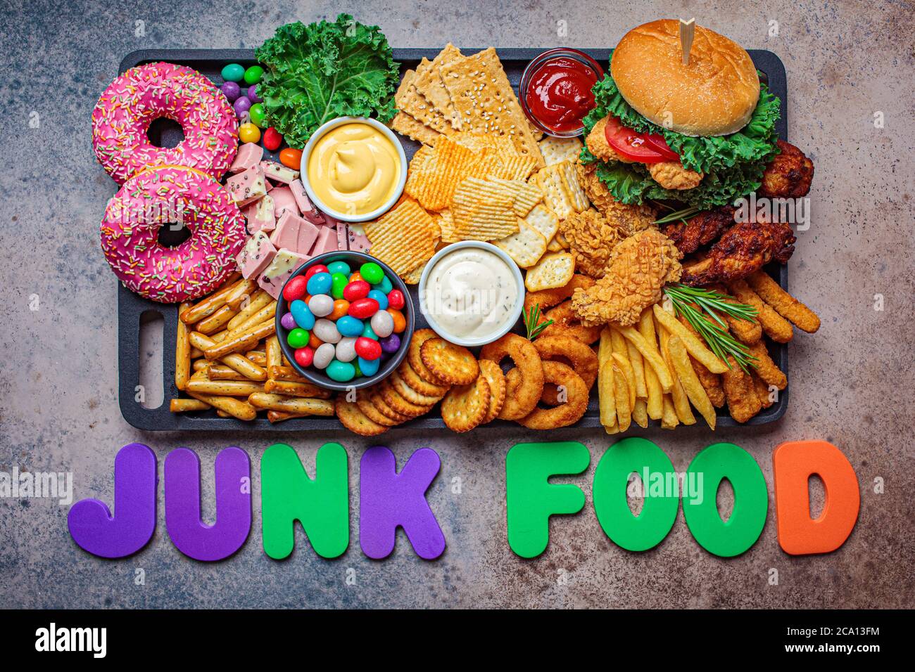 Fast food assortment. Junk food concept. Unhealthy food for the heart ...